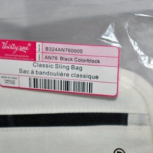 thirty-one | Bags | Thirty One Classic Sling Bag In Black Colorblock ...